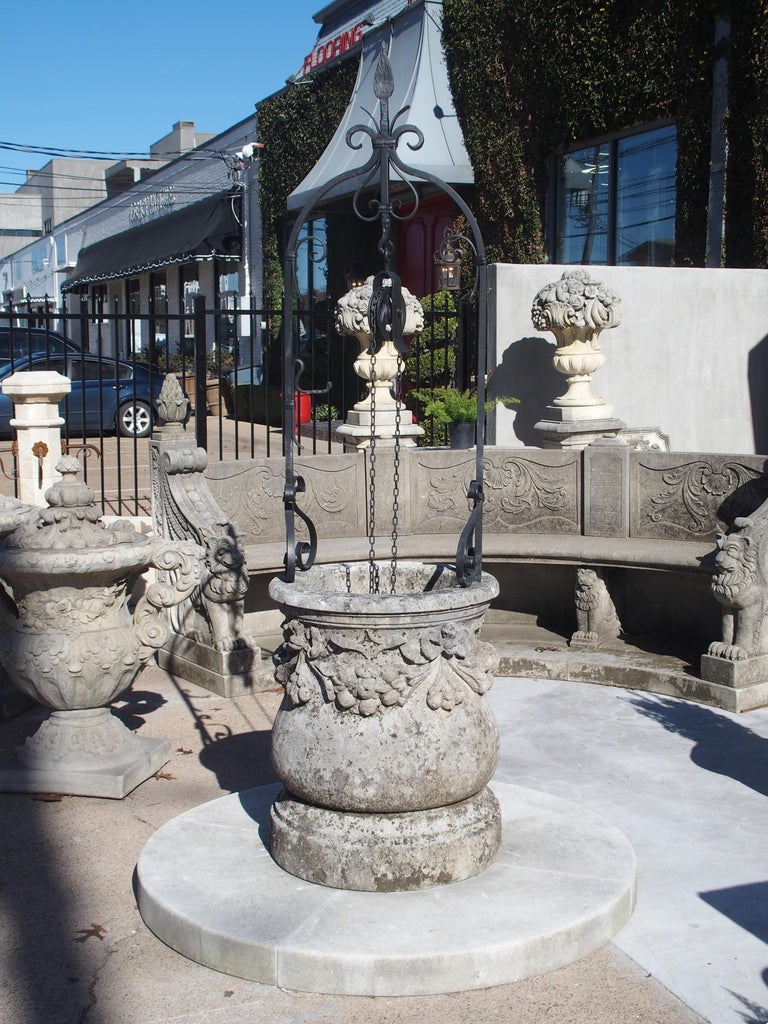 Carved Italian Limestone Well with Iron Overthrow at 1stDibs