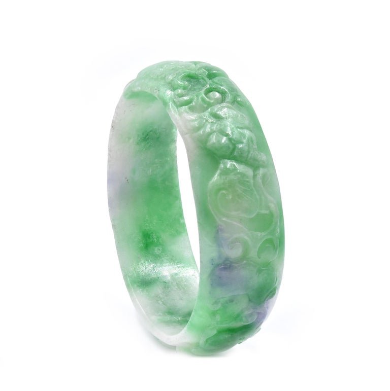 Carved Jade Bangle Bracelet at 1stDibs