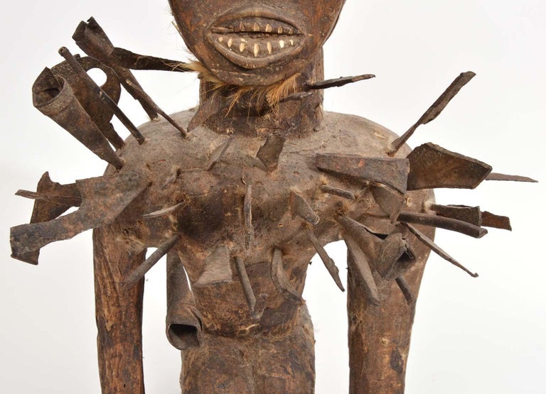 Carved Nkisi N'kondi Power Statue with Inserted Metal Objects and ...