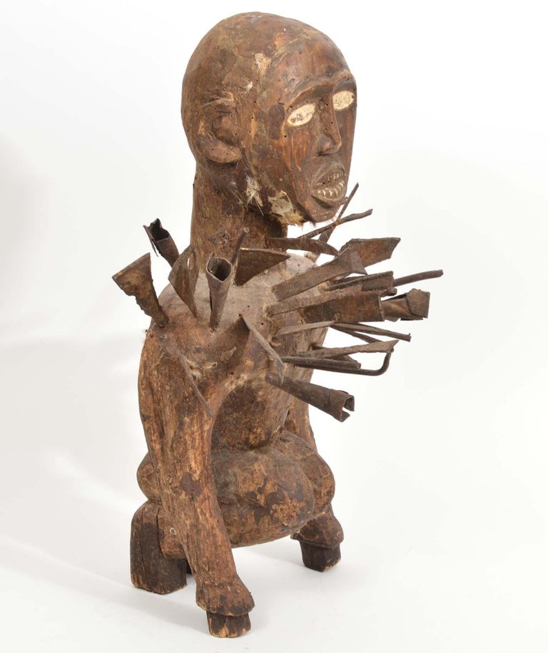 Carved Nkisi N'kondi Power Statue with Inserted Metal Objects and ...