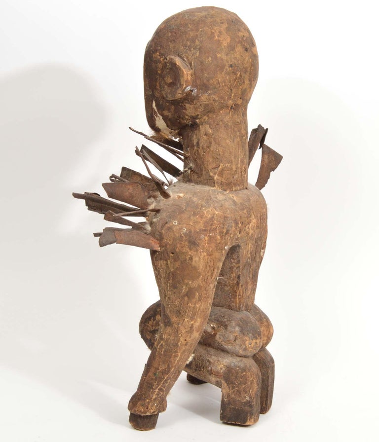 Carved Nkisi N'kondi Power Statue with Inserted Metal Objects and ...
