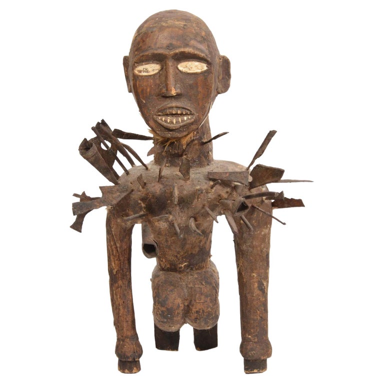 Carved Nkisi N'kondi Power Statue with Inserted Metal Objects and ...