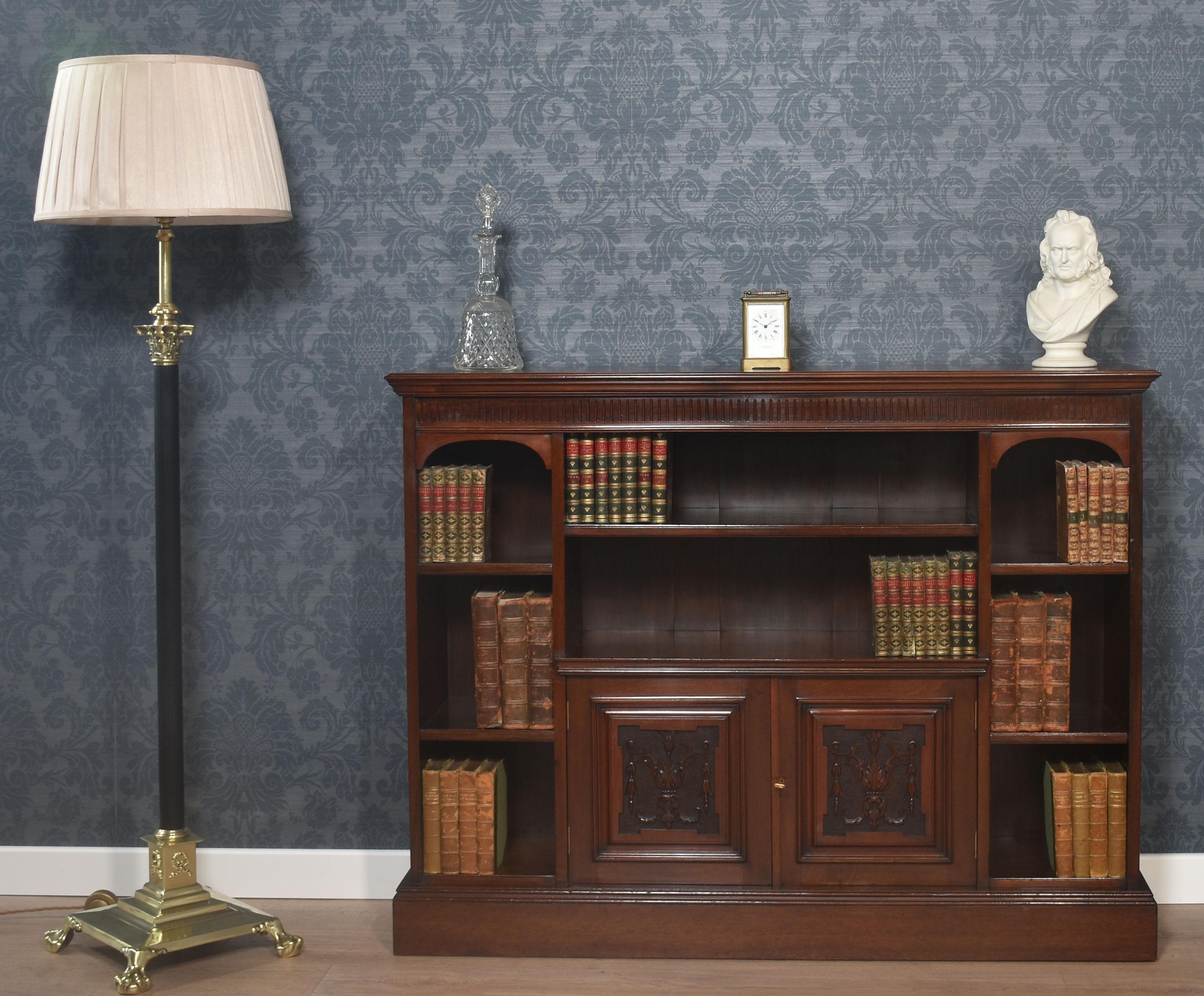 Carved walnut open bookcase For Sale at 1stDibs
