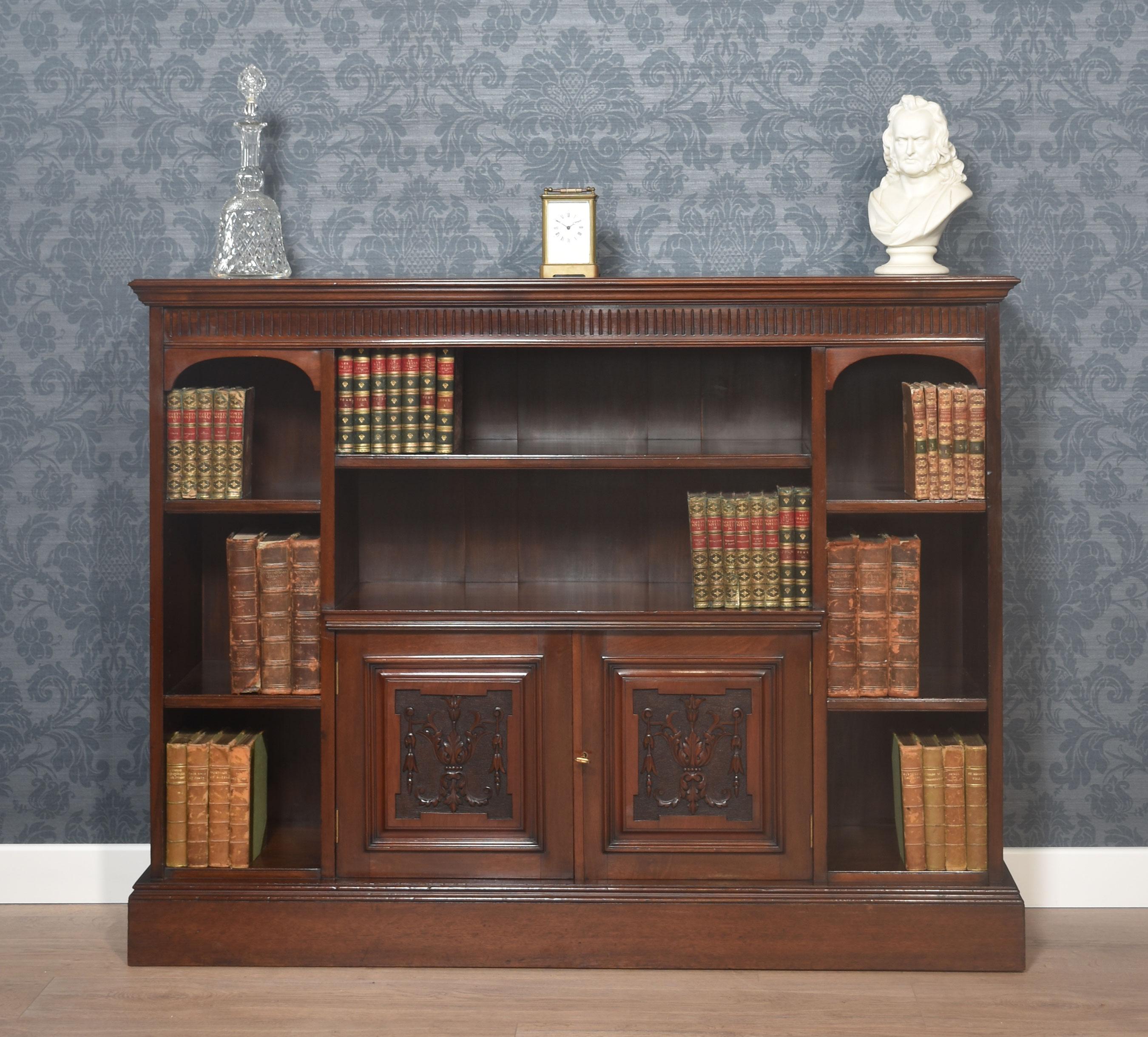 Carved walnut open bookcase For Sale at 1stDibs