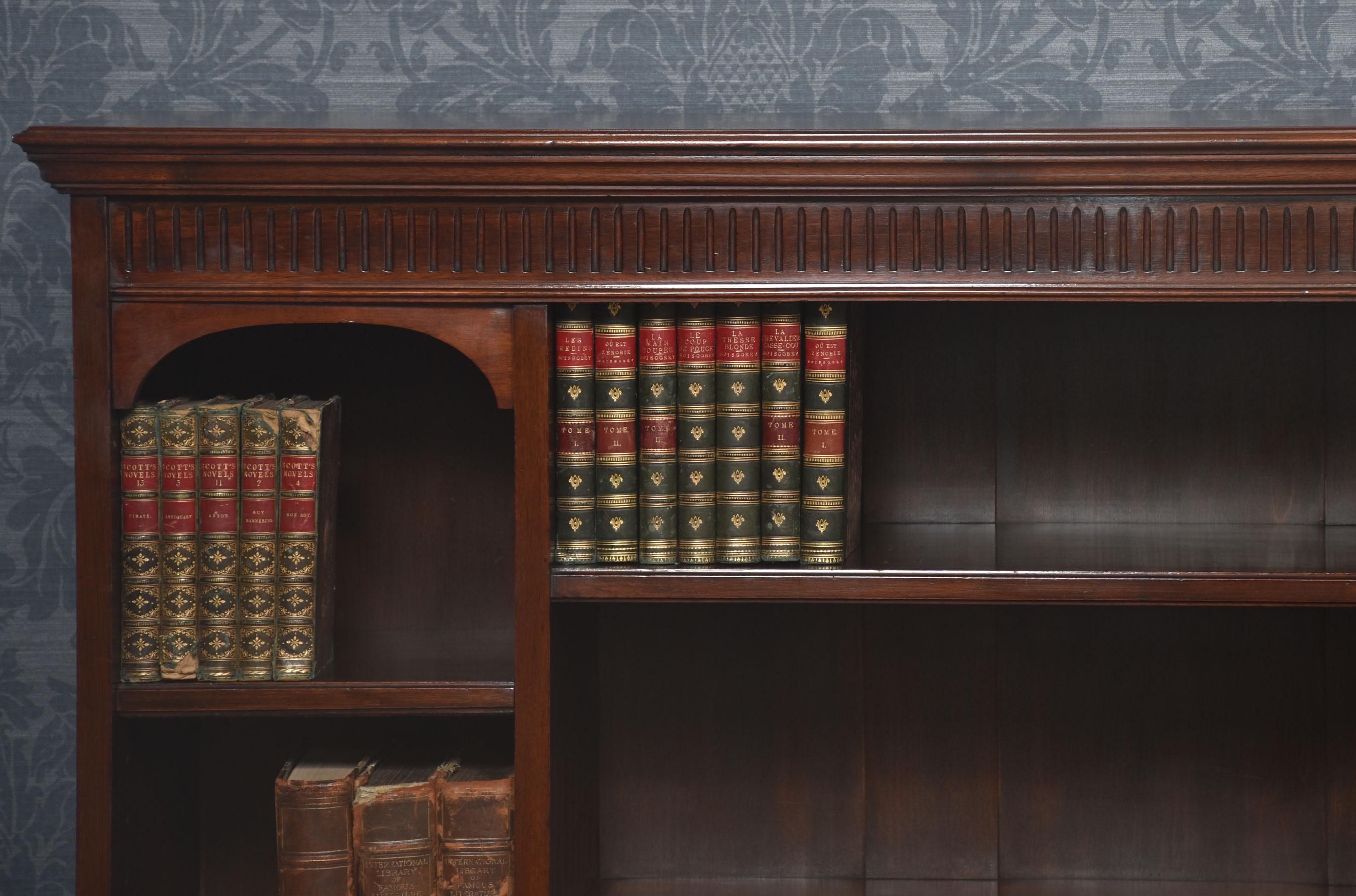 Carved walnut open bookcase For Sale at 1stDibs