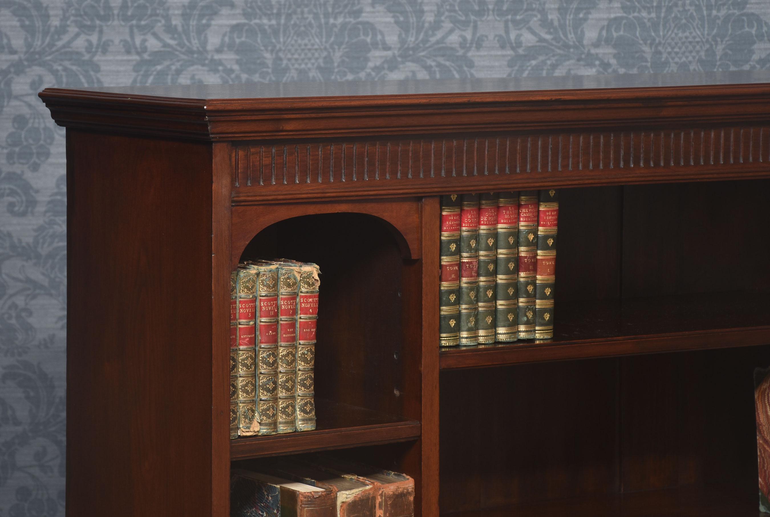 Carved walnut open bookcase For Sale at 1stDibs