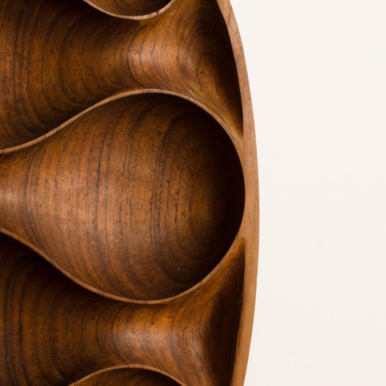 Carved Wood Almond Shaped Sculpture and Base For Sale at 1stDibs