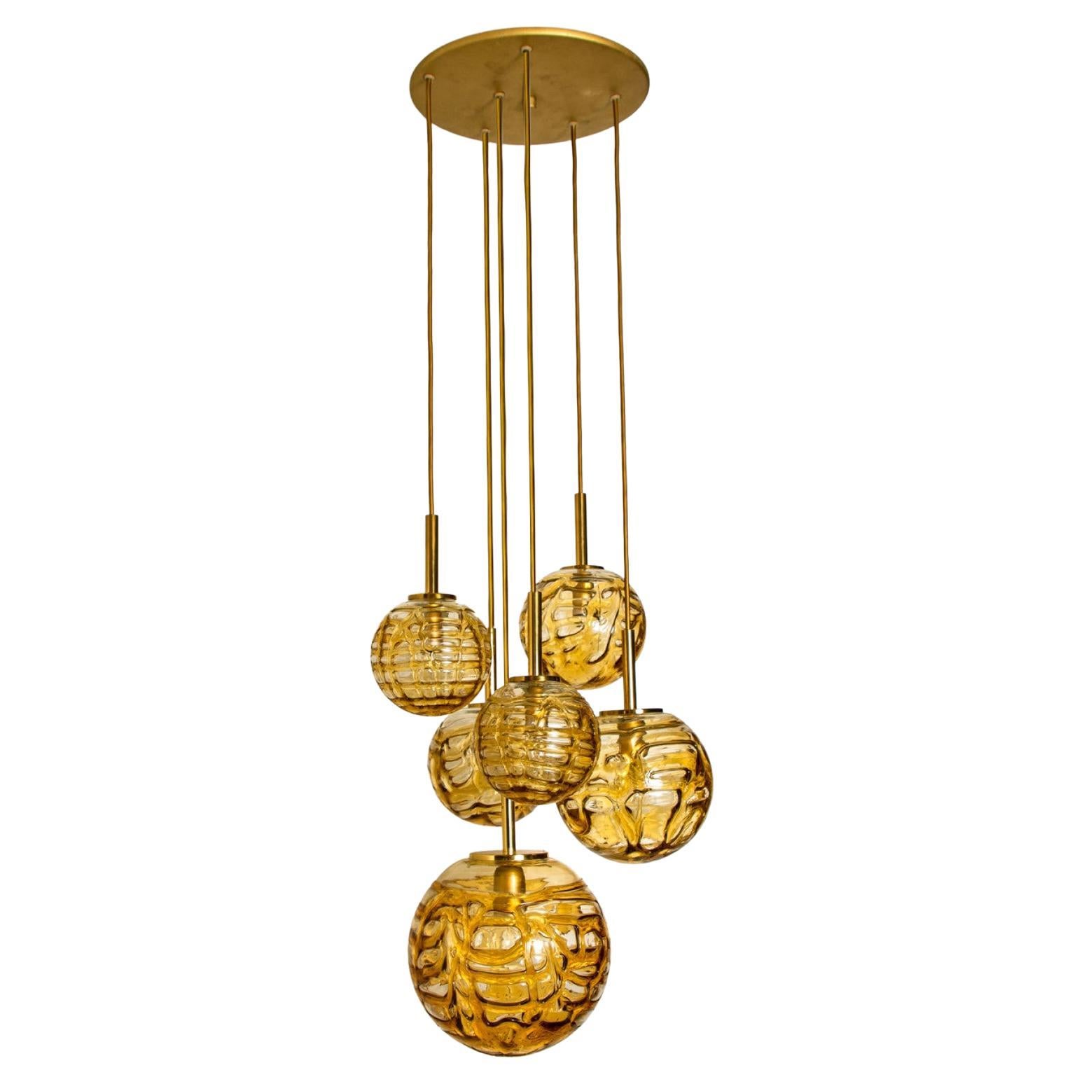 Four-Globe, Cascading Form Cahndelier For Sale at 1stDibs