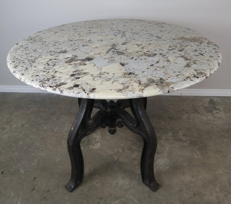 Cast Iron and Travertine Top Table at 1stDibs