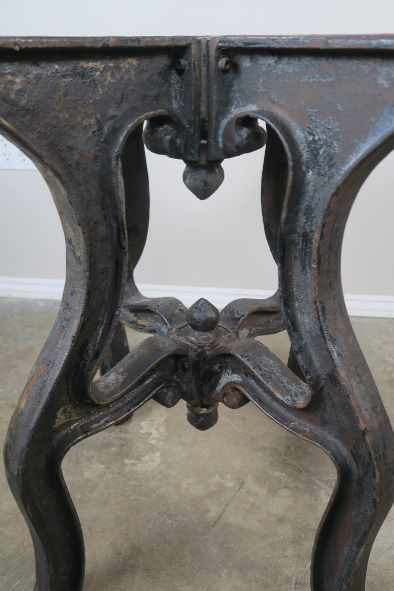 Cast Iron and Travertine Top Table at 1stDibs