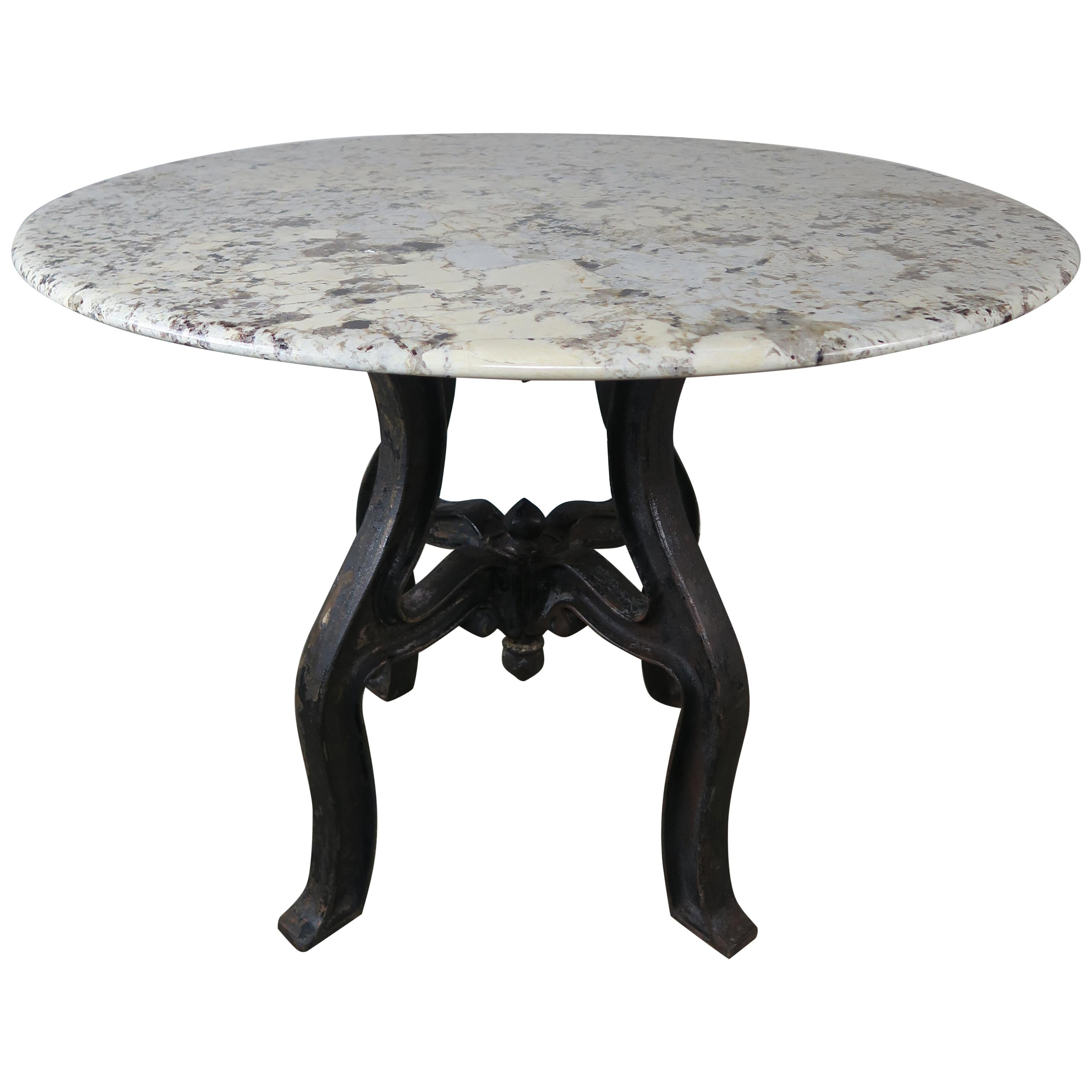 Cast Iron and Travertine Top Table at 1stDibs