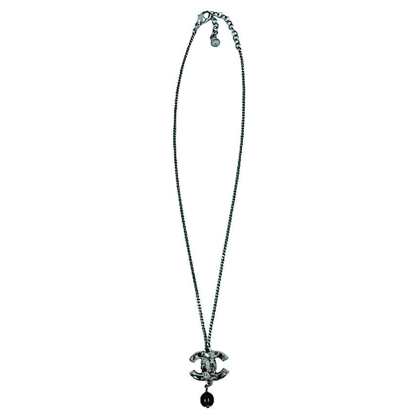 Silver-Tone Long Chain Chanel CC Necklace Features a Solid CC Logo ...