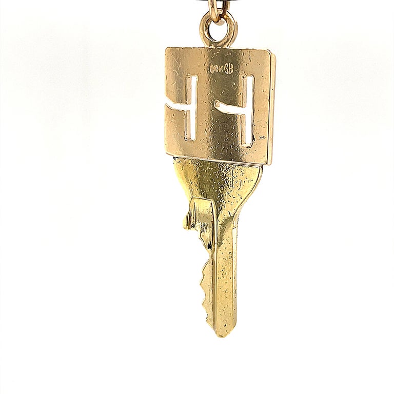"CC" Gold Key Pendant For Sale at 1stDibs