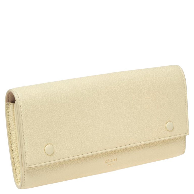Celine Light Yellow Leather Multifunction Flap Wallet at 1stDibs
