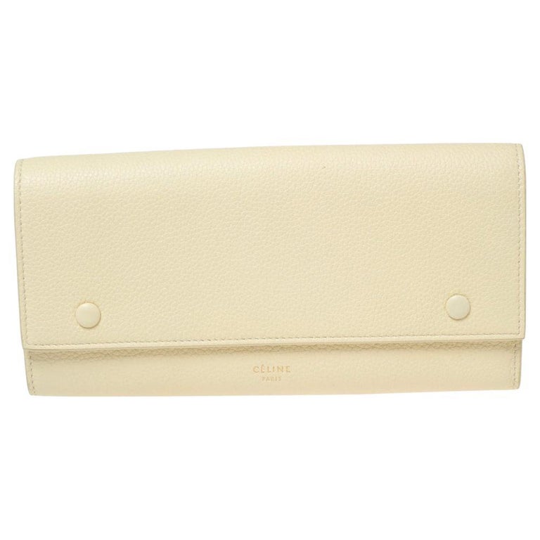Celine Light Yellow Leather Multifunction Flap Wallet at 1stDibs