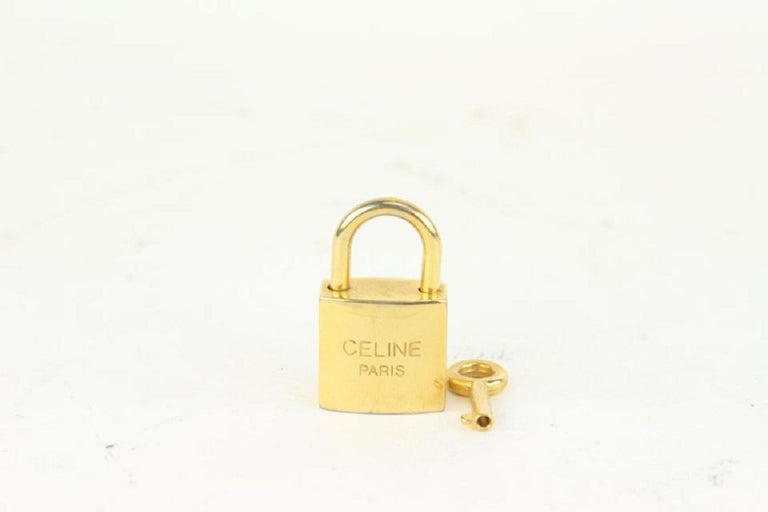 Céline Logo Padlock and Key Cadena Set 917cel11 For Sale at 1stDibs