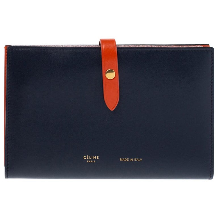 Celine Navy Blue/Orange Leather Large Multifunction Strap Wallet at 1stDibs