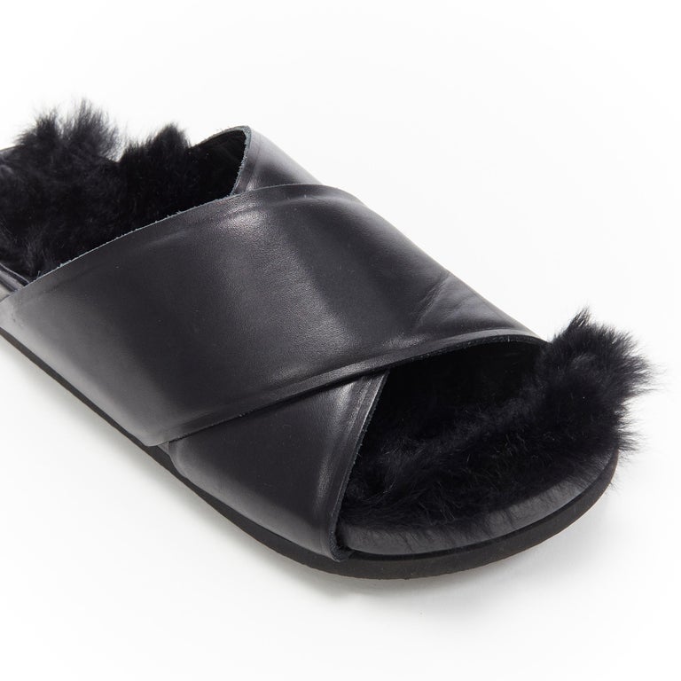 CELINE PHOEBE PHILO black rabbit fur lined cross strap flat sandals ...