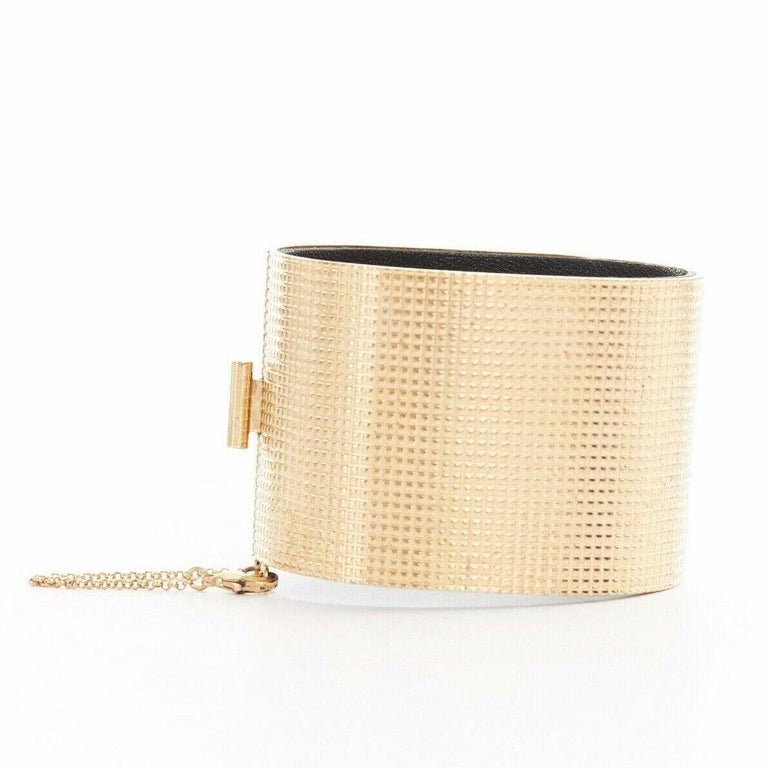 CELINE PHOEBE PHILO Manchette gold-tone grid textured bracelet cuff ...