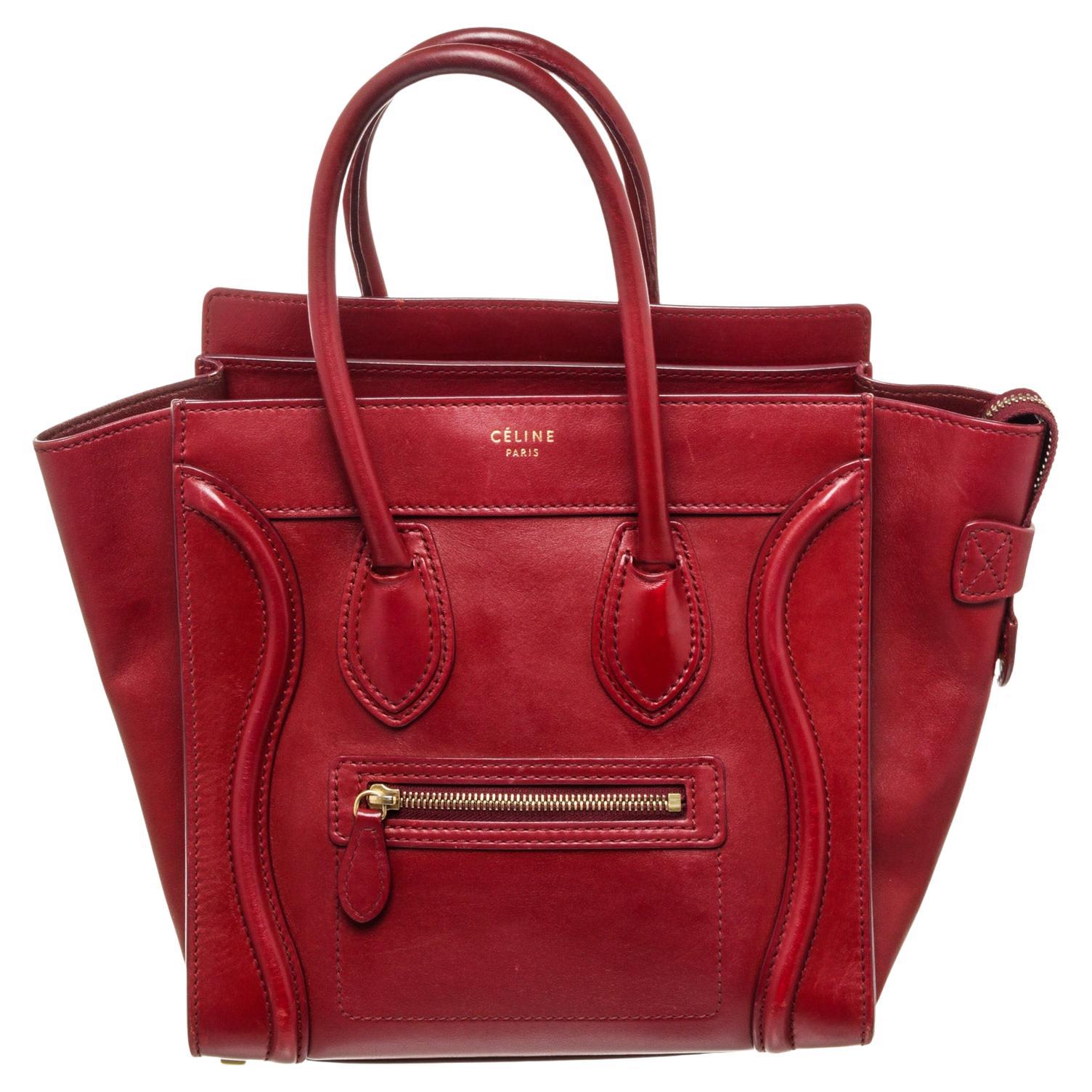 Vintage Celine Red Ostrich bag with golden hardware. at 1stDibs