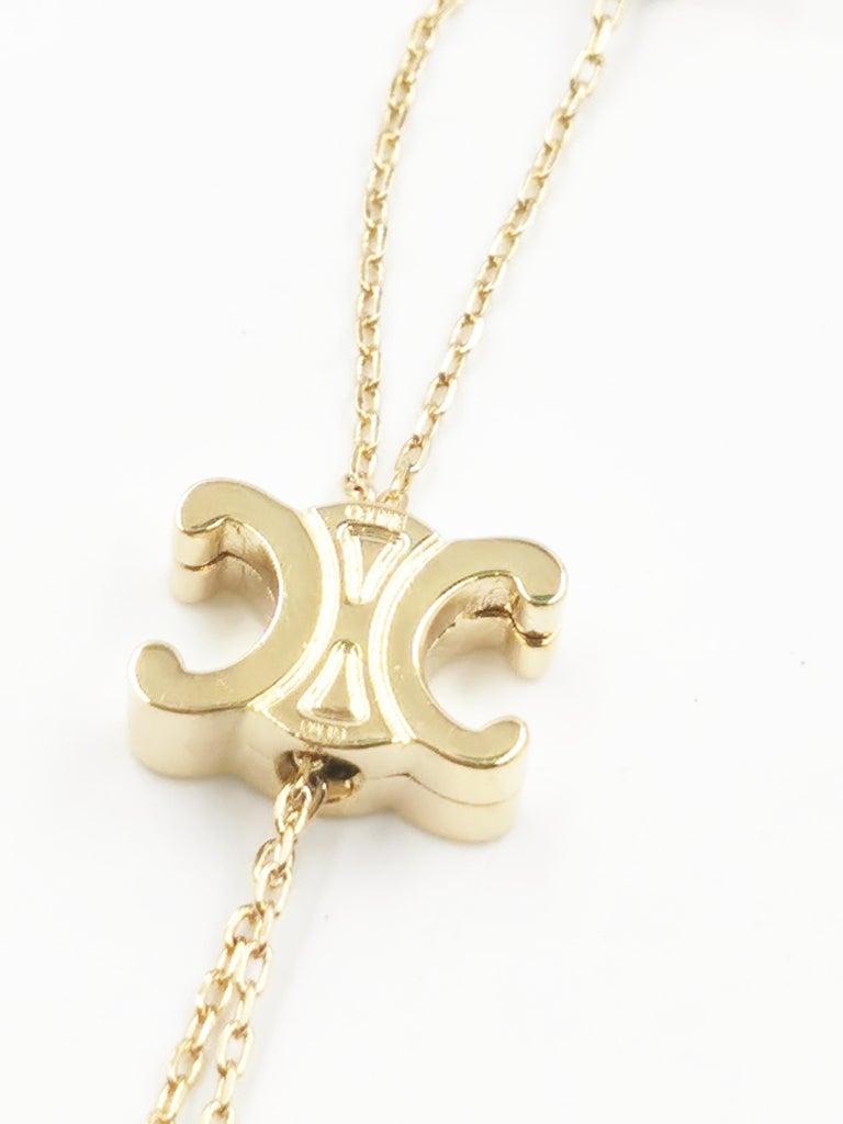 Celine Triomphe Logo Gold Tassel Earrings Long Thread For Sale at 1stDibs