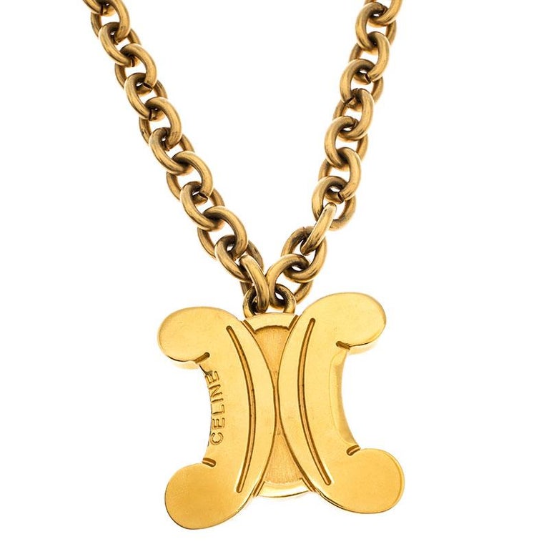Celine Vintage Gold Tone Logo Pendant Blazon Necklace at 1stDibs