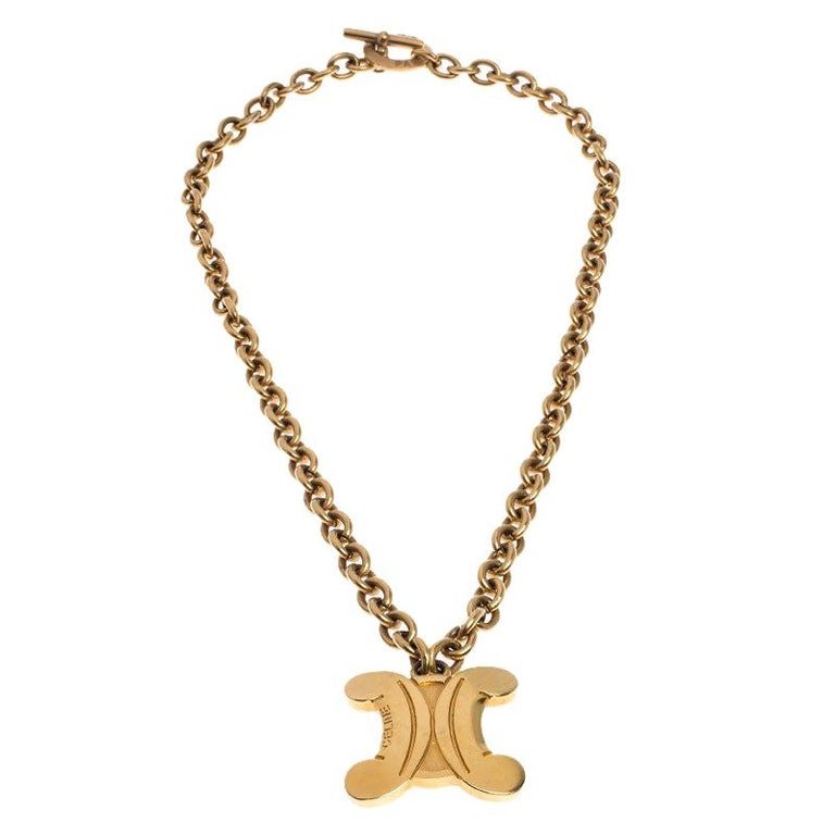 Celine Vintage Gold Tone Logo Pendant Blazon Necklace at 1stDibs