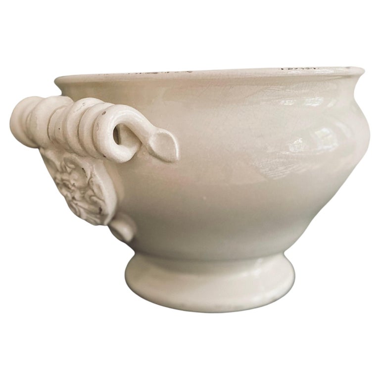 Ceramic bowl, ivory colored with crackle glaze and masqueron ...