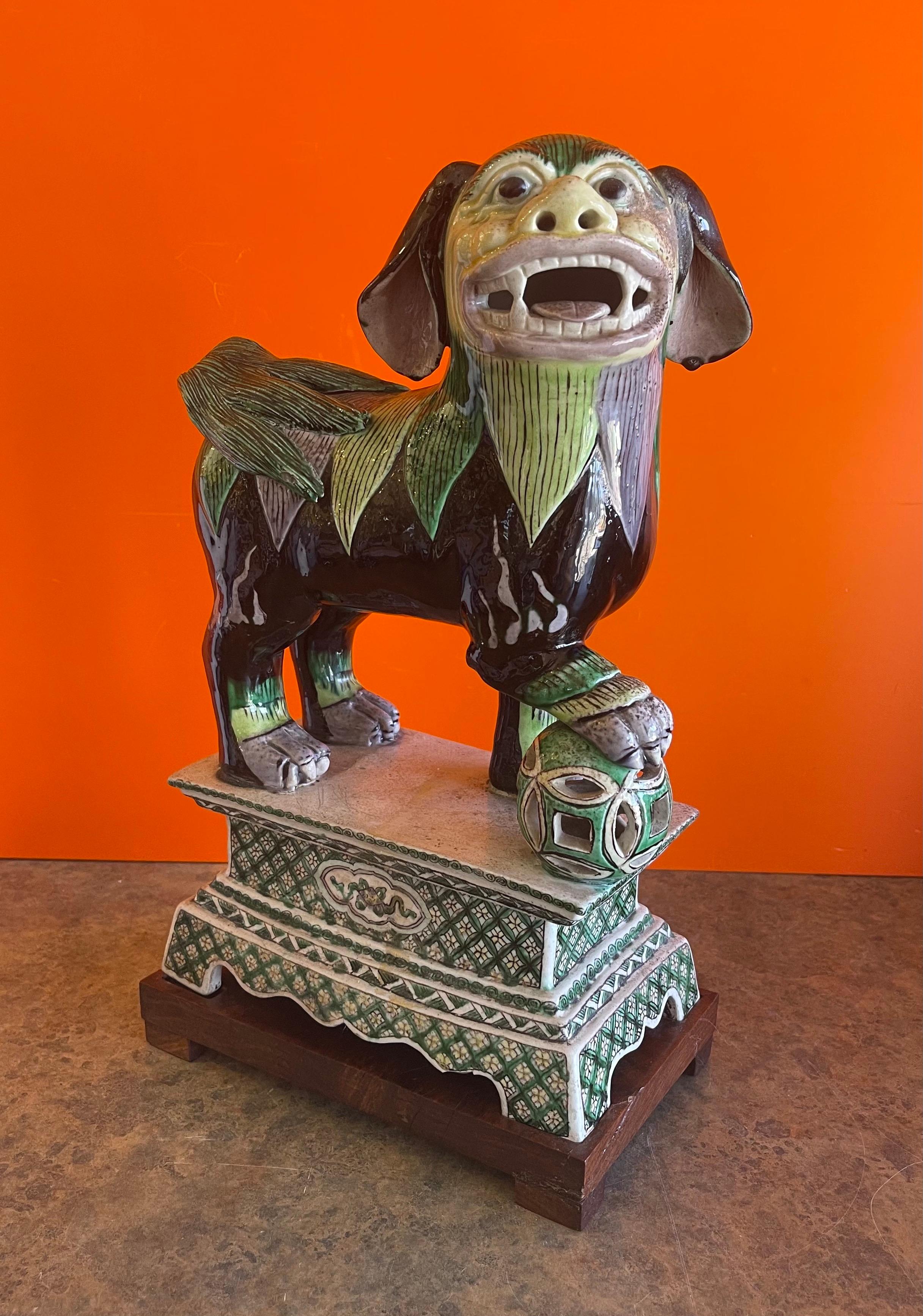 Ceramic Foo Dog Sculpture on Mahogany Base For Sale at 1stDibs