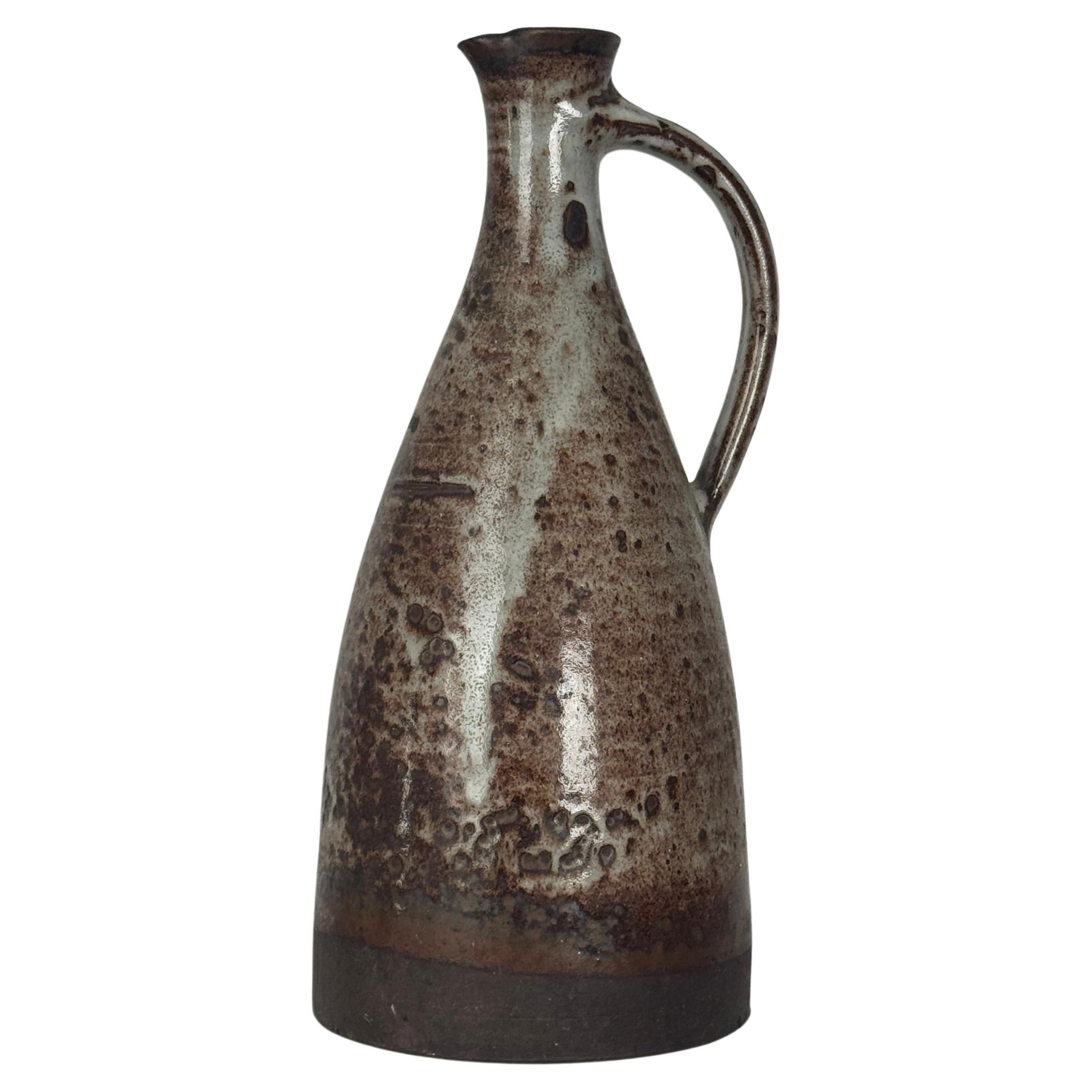 Iridescent Black Ceramic Pitcher at 1stDibs