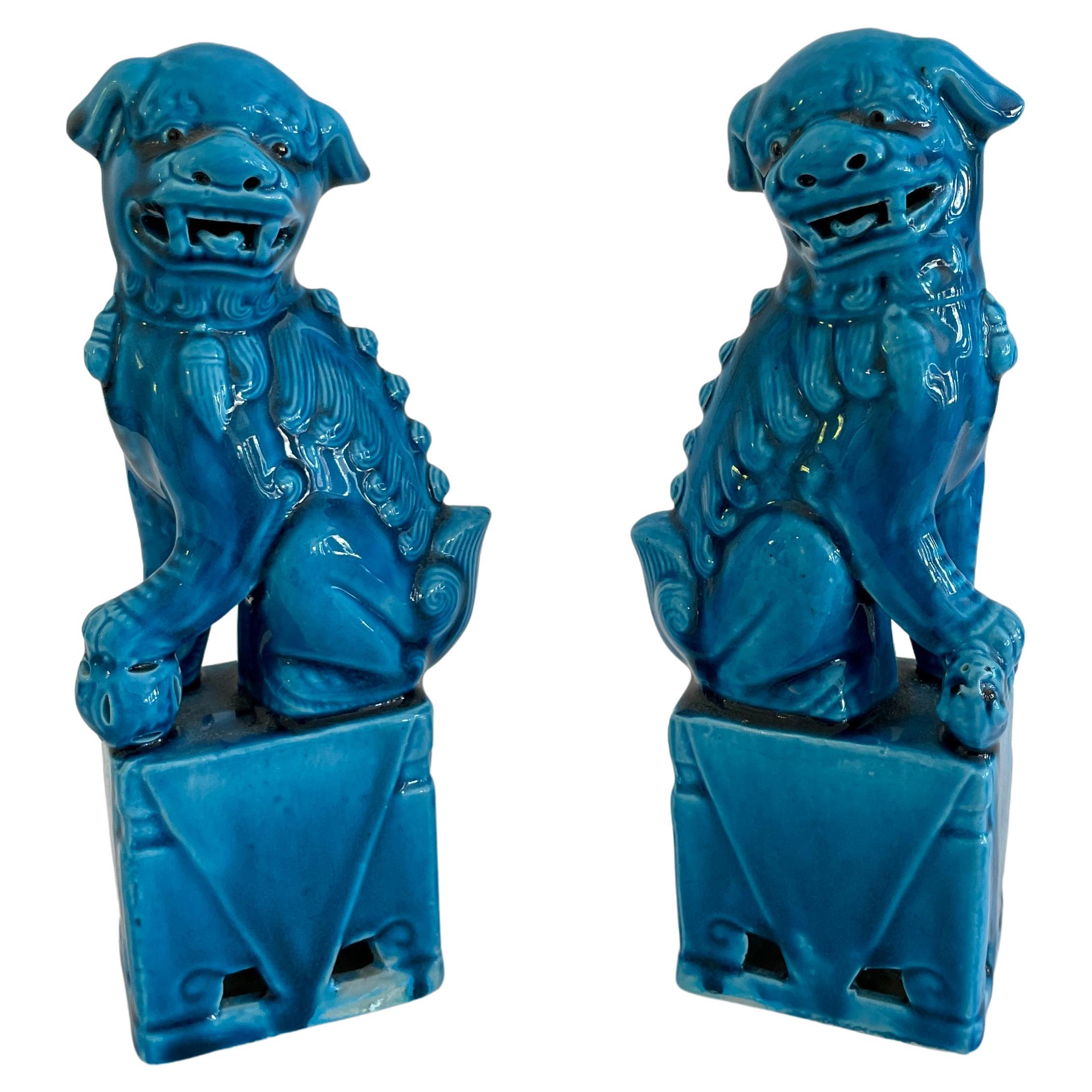 Pair of Chinese Turquoise Glazed Porcelain Mounted Foo Dogs at 1stDibs