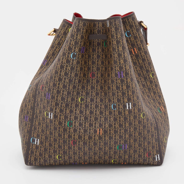 CH Carolina Herrera Brown Monogram Coated Canvas Bucket Bag For Sale at ...