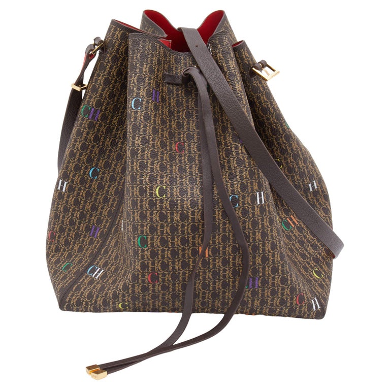 CH Carolina Herrera Brown Monogram Coated Canvas Bucket Bag For Sale at ...