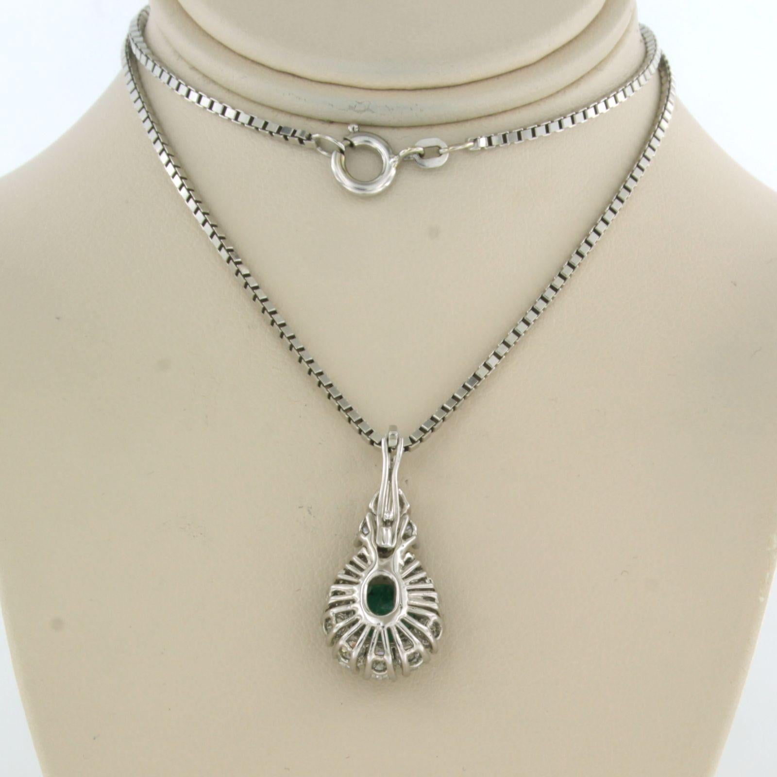 Chain and pendant set with emerald and briljant cut diamonds 14k white ...