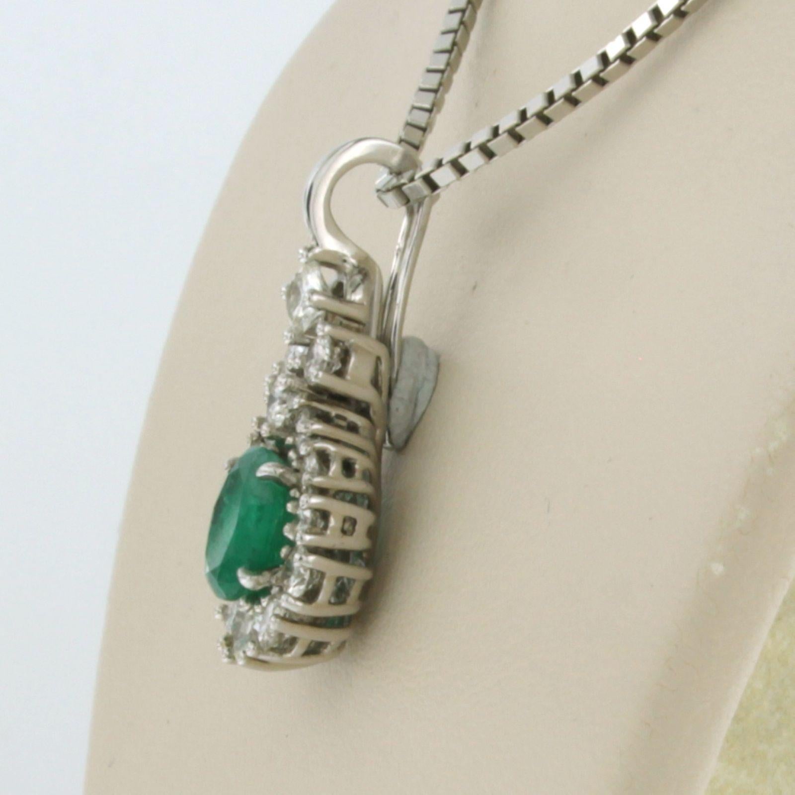 Chain and pendant set with emerald and briljant cut diamonds 14k white ...