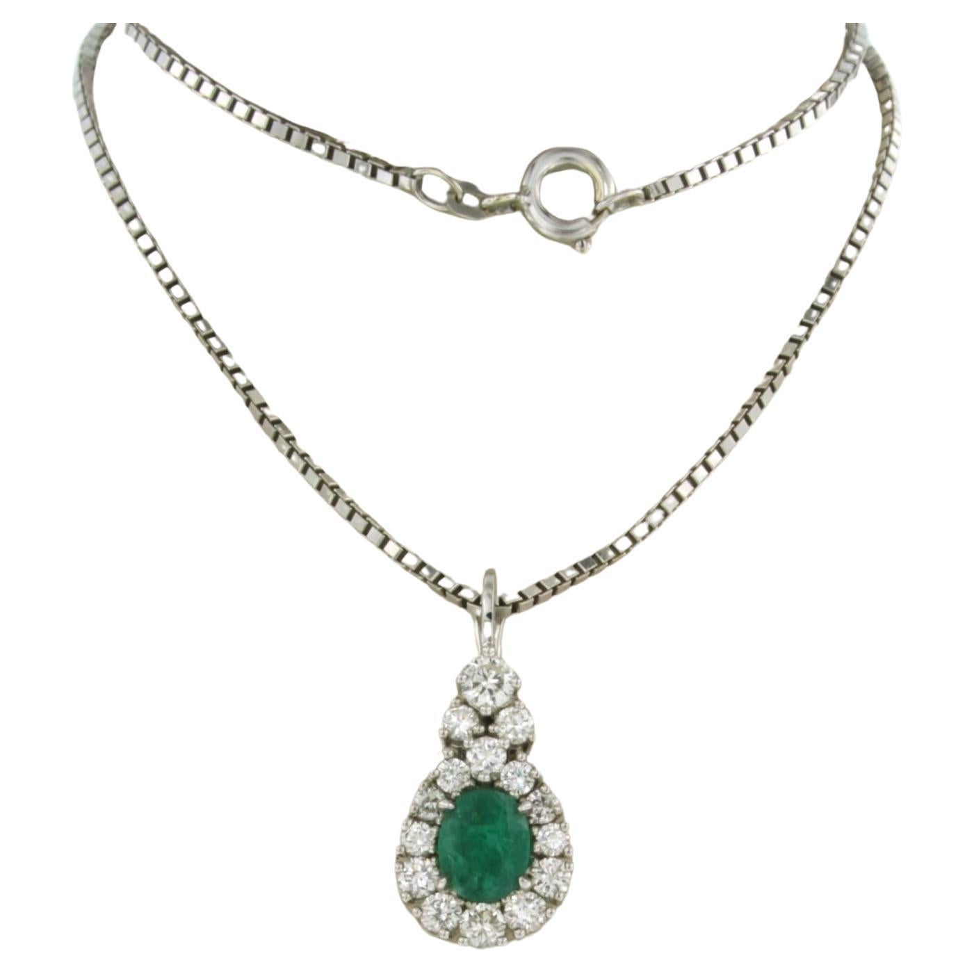 Chain and pendant set with emerald and briljant cut diamonds 14k white ...