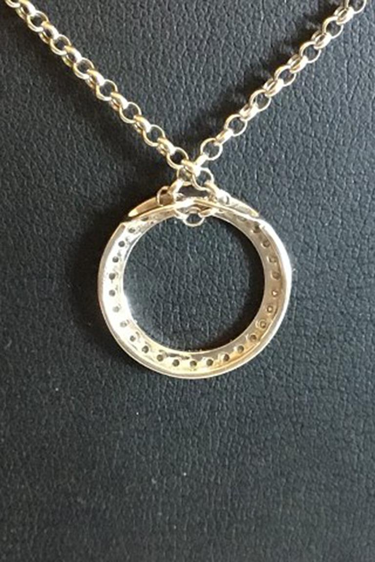 Chain in 14 Karat White Gold with Round Pendant with 30 Small Stones ...
