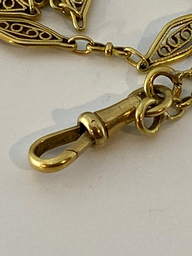 Chaine collier “ sautoir ” en or 18 Carats à mailles filigranes vers ...