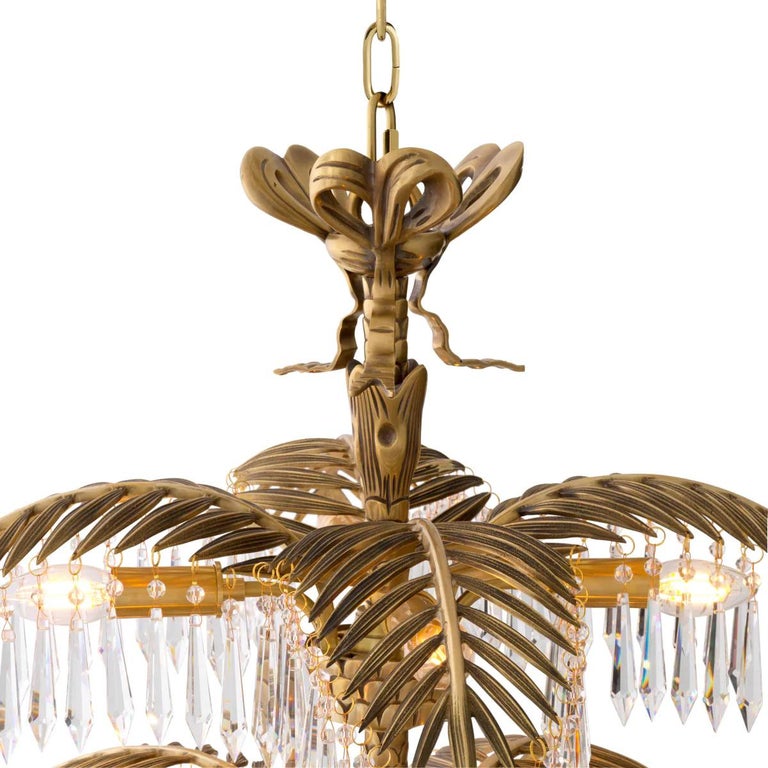 Lustre en laiton et cristal En vente sur 1stDibs