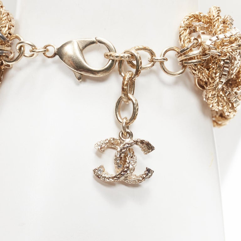 CHANEL 17A Paris Cosmopolite gold CC crystal charm twist chain bracelet ...