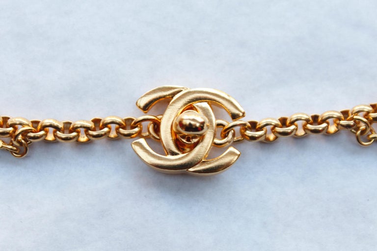 CHANEL 1996P Gilted metal chain with "Chanel" letters charms at 1stDibs