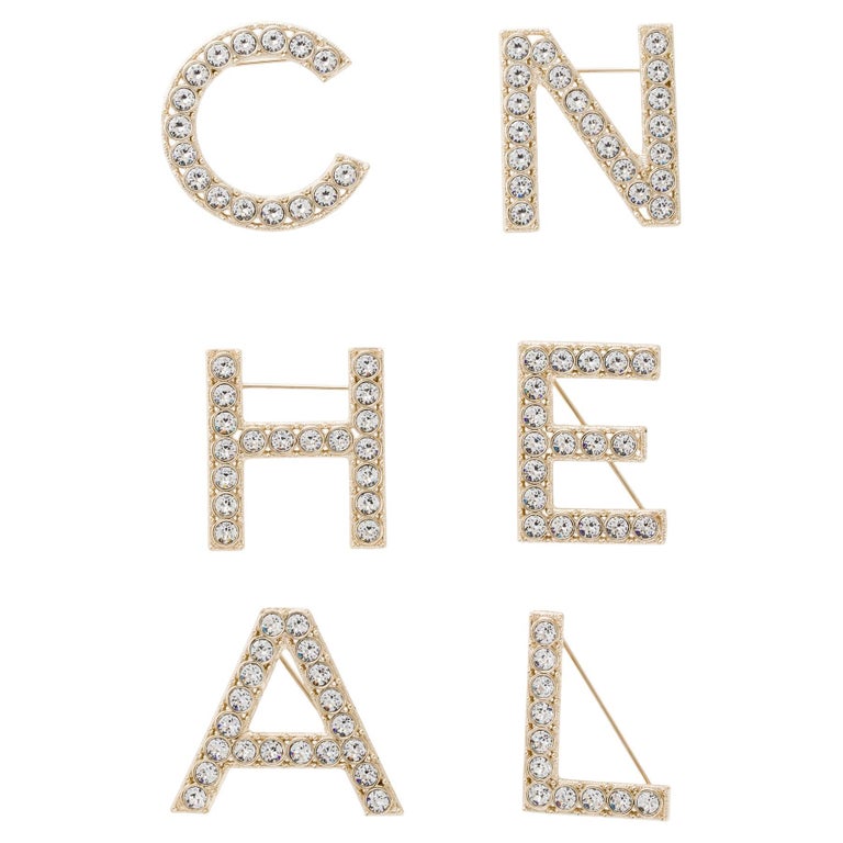 CHANEL 2019 Strass Logo Letters Brooch Set NEW With Tags For Sale at ...