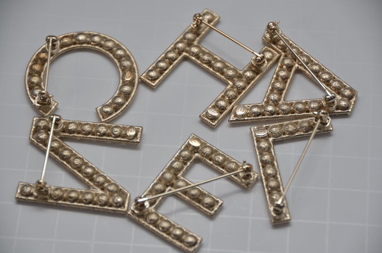 CHANEL 2019 Strass Logo Letters Brooch Set NEW With Tags For Sale at ...