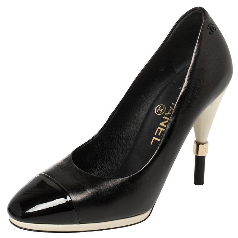 Chanel Black Leather And Patent Leather CC Cap Toe Pumps Size 35.5 at ...