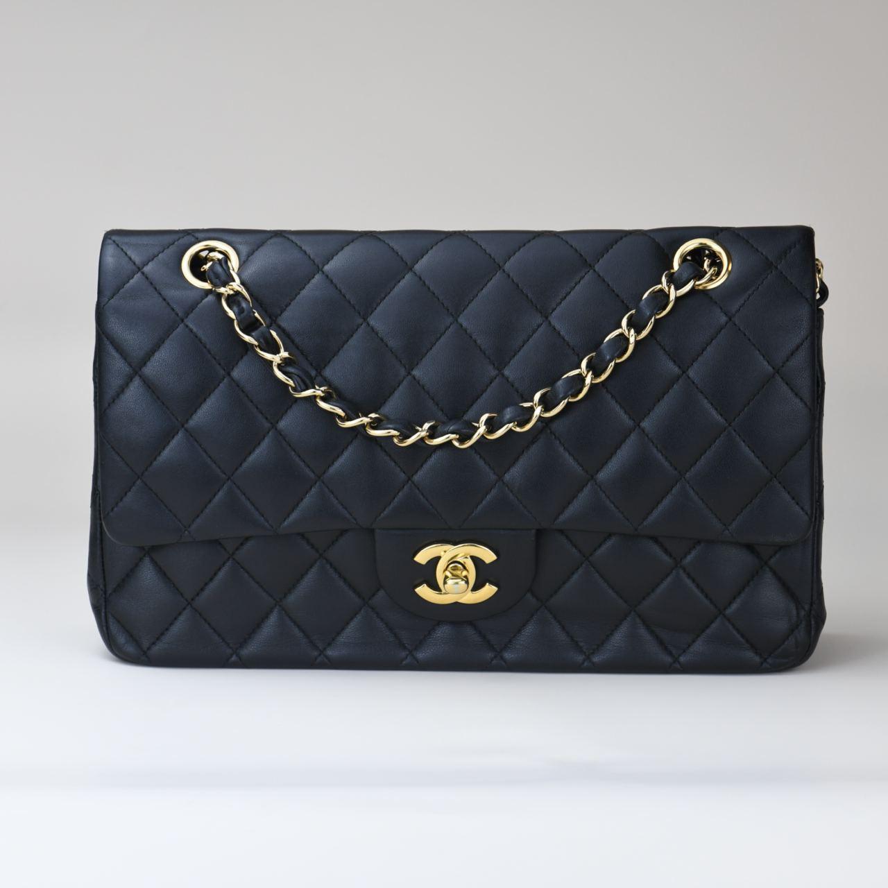 CHANEL Black Quilted Lambskin Timeless Classic Medium Double Flap Bag ...