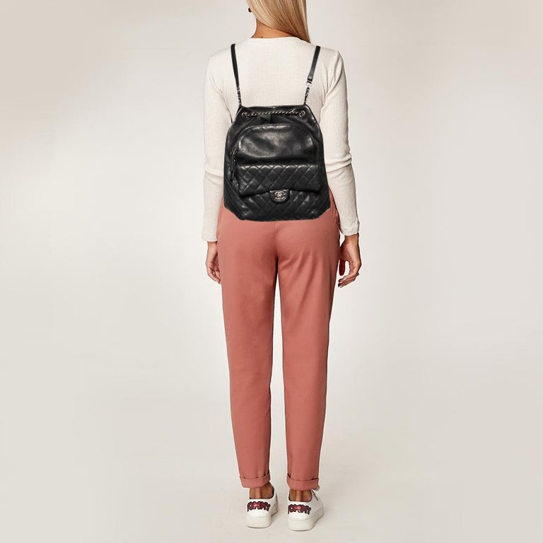Chanel Black Quilted Leather Small Drawstring CC Flap Backpack at 1stDibs