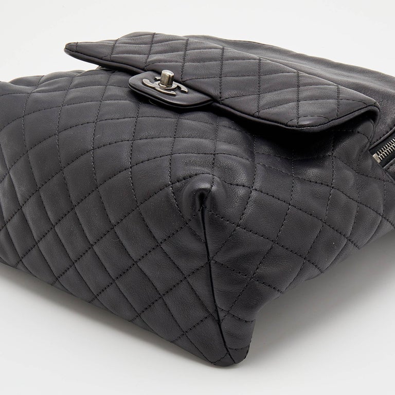 Chanel Black Quilted Leather Small Drawstring CC Flap Backpack at 1stDibs