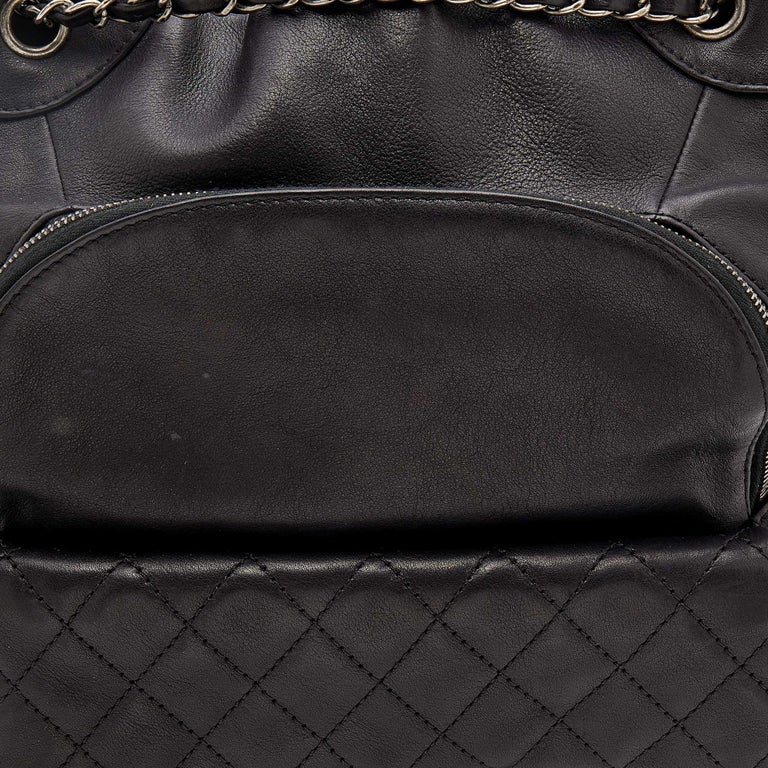 Chanel Black Quilted Leather Small Drawstring CC Flap Backpack at 1stDibs