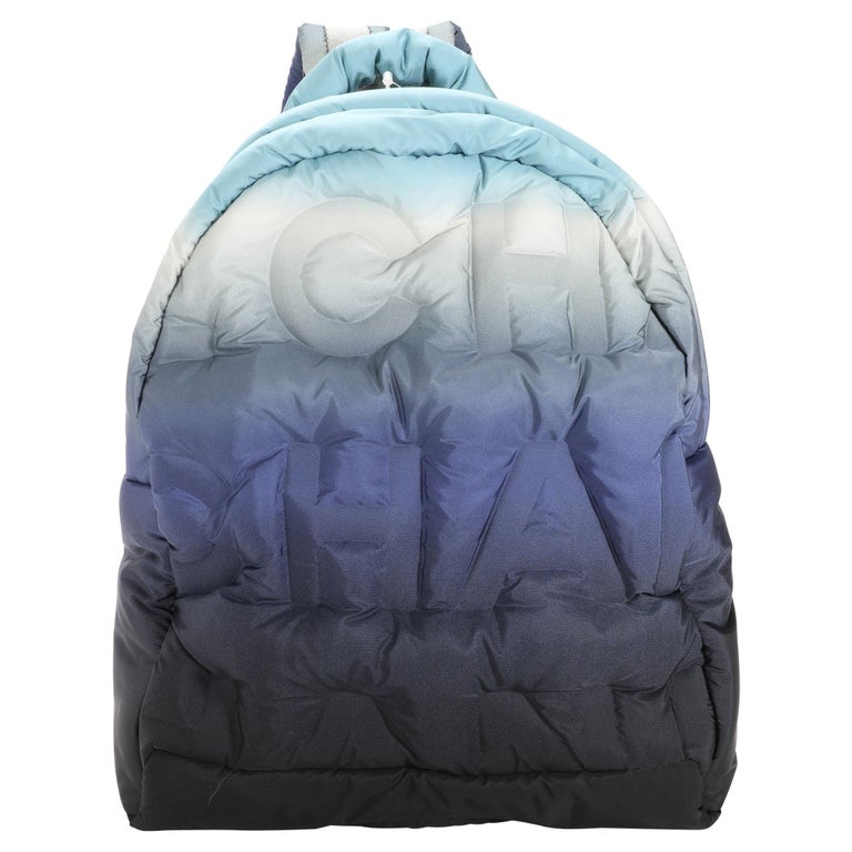 Chanel Blue Ombre Logo Embossed Nylon Doudoune Backpack For Sale at 1stDibs