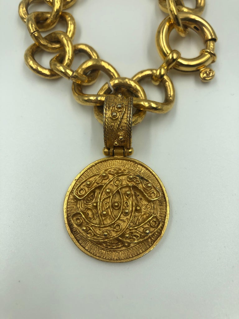 Chanel CC Logo Bracelet Gold Tone Filigree with a Hanging CC Medallion ...